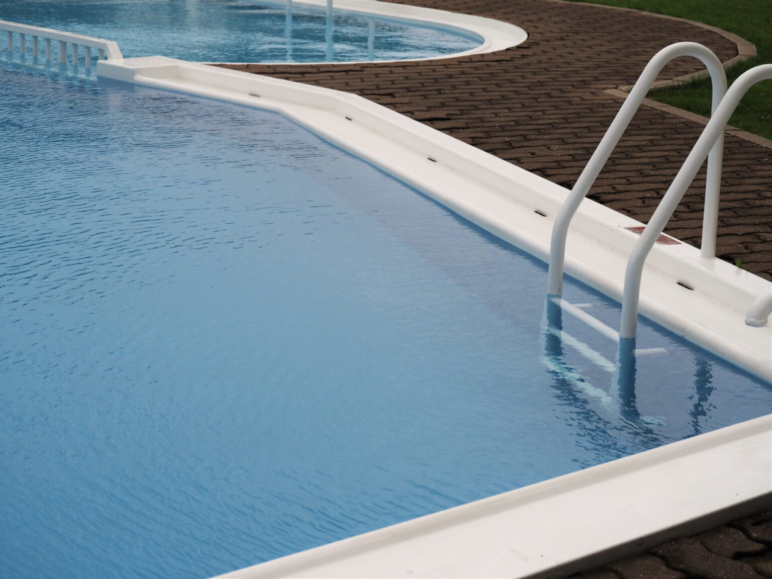 7 Budget-Friendly Pool Decking Ideas to Dive Into - Swimmer Living